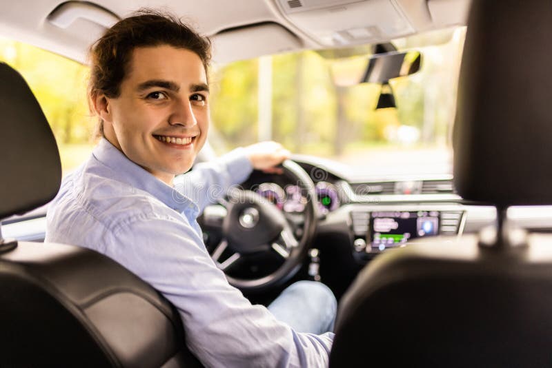 Transport, Vehicle and Driving Concept. Young Man or Car Driver Looking ...