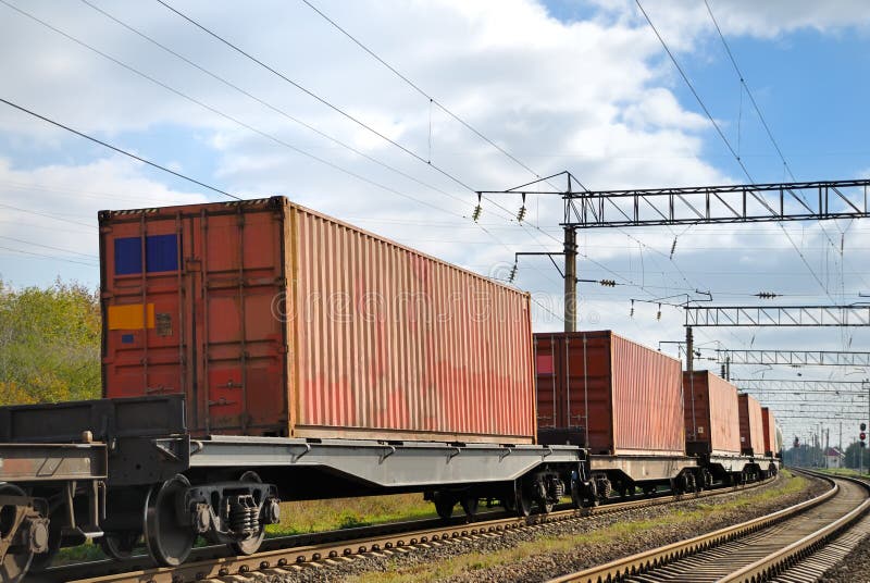 Crane Lifts a Container Loading a Train Stock Photo - Image of load ...