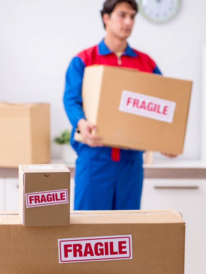Transportation Contractor with Fragile Boxes Stock Photo - Image of ...
