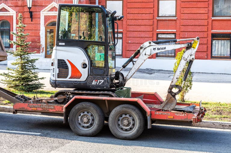 Transportation of Small Backhoe on a Cargo Platform Editorial Stock ...