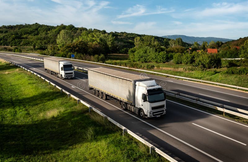 Transportation Trucks on Road Stock Photo - Image of waterway, bridge ...