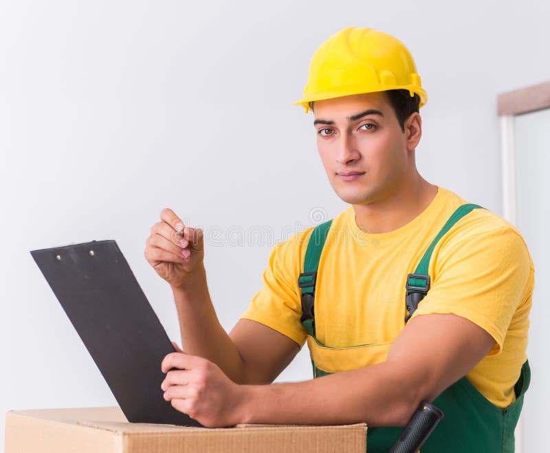 Transportation Worker Delivering Boxes To House Stock Photo - Image of ...