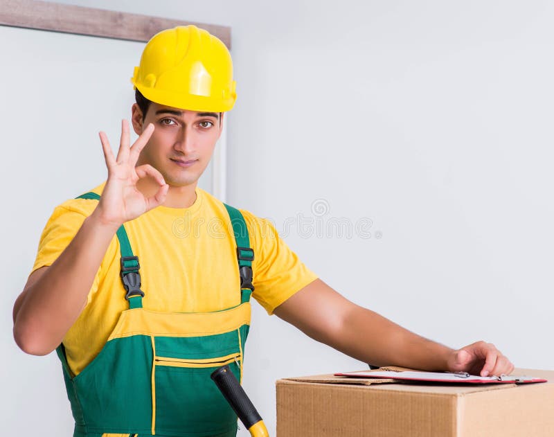 Transportation Worker Delivering Boxes To House Stock Image - Image of ...