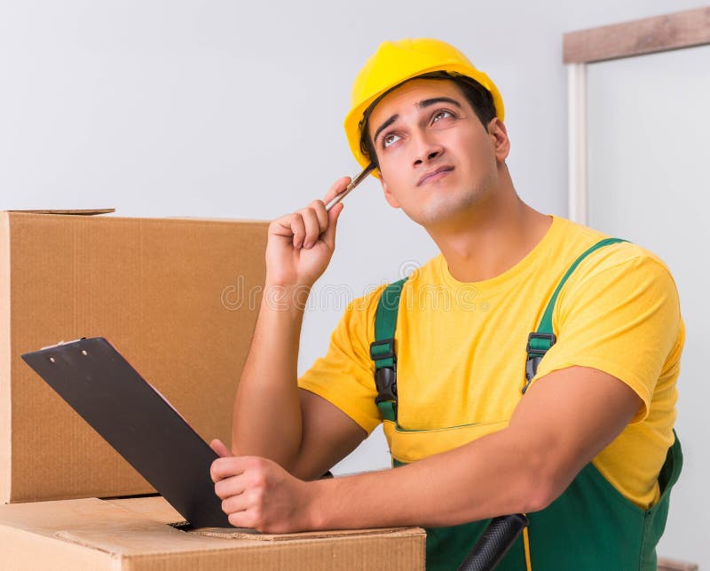 Transportation Worker Delivering Boxes To House Stock Photo - Image of ...