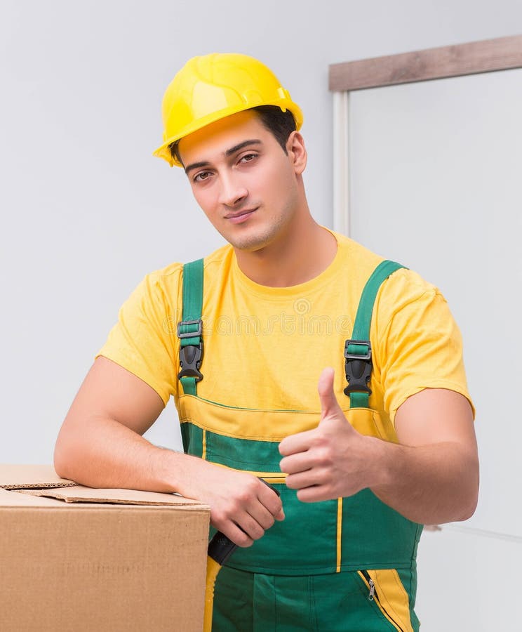 Transportation Worker Delivering Boxes To House Stock Photo - Image of ...