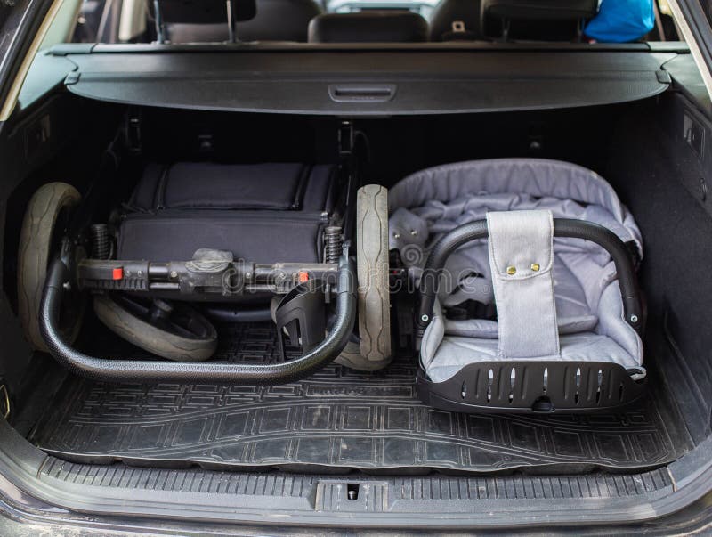 Transporting a Baby Stroller in the Trunk of a Car when Folded, Close ...