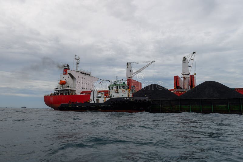 Transporting Coal into Large Ships in the Middle of the Sea Editorial ...