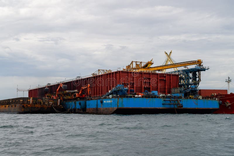 Transporting Coal into Large Ships in the Middle of the Sea Editorial ...