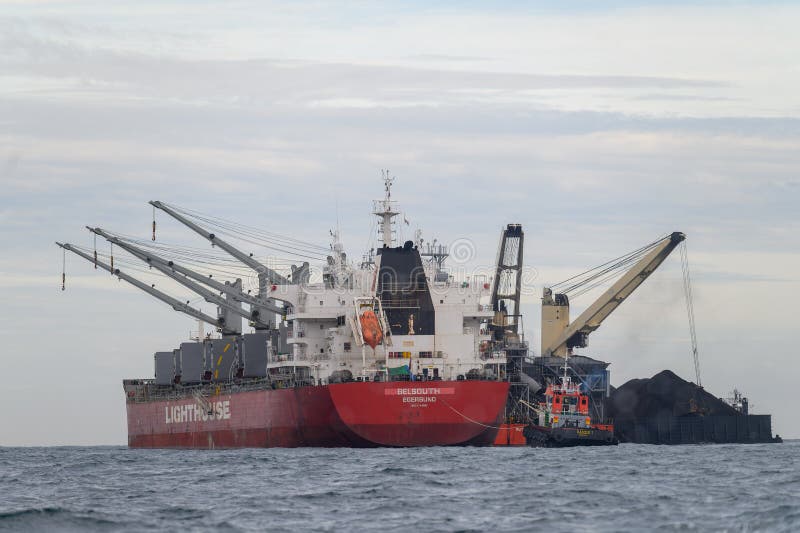 Transporting Coal into Large Ships in the Middle of the Sea Editorial ...