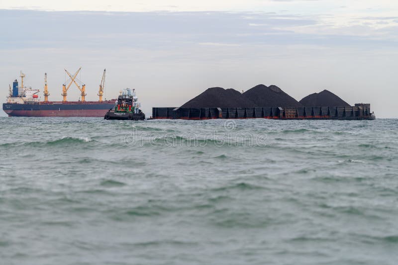 Transporting Coal into Large Ships in the Middle of the Sea Editorial ...
