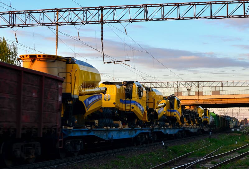 Transporting Combine Harvesters by Rail. Editorial Stock Image - Image ...