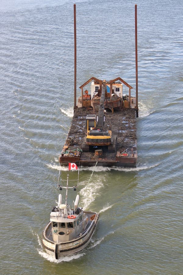 Tug Boat Transporting Log Boom Stock Image - Image of bunch ...
