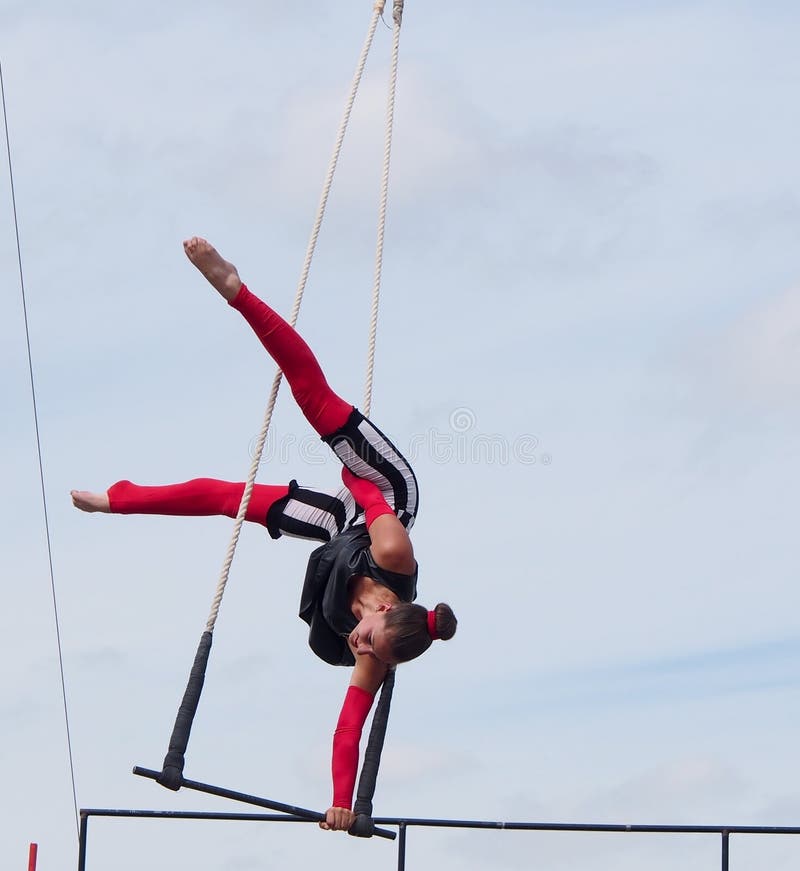 Trapeze Artist Hung Upside Down During Her Performance. Editorial Image ...