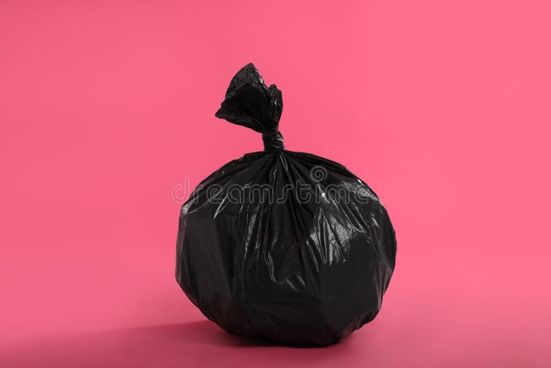 Trash Bag Full of Garbage on Pink Background Stock Photo - Image of ...
