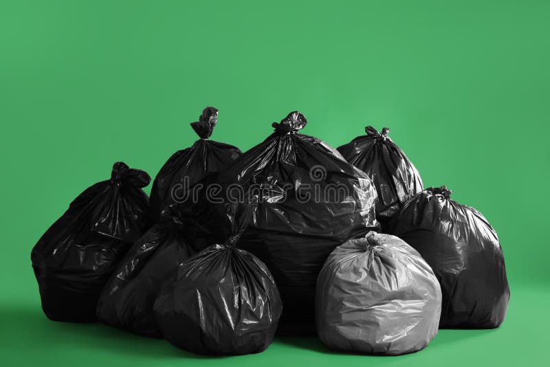 Trash Bags Full of Garbage on Green Background Stock Image - Image of ...