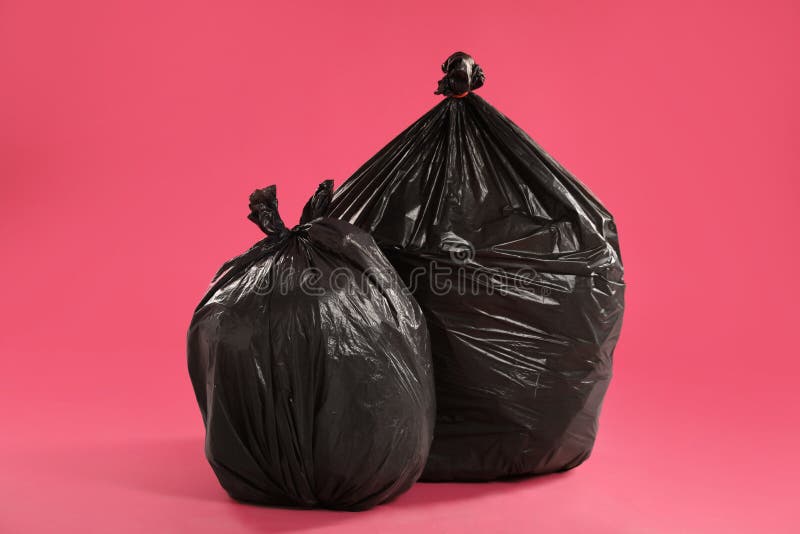 Trash Bags Full of Garbage on Pink Background Stock Image - Image of ...