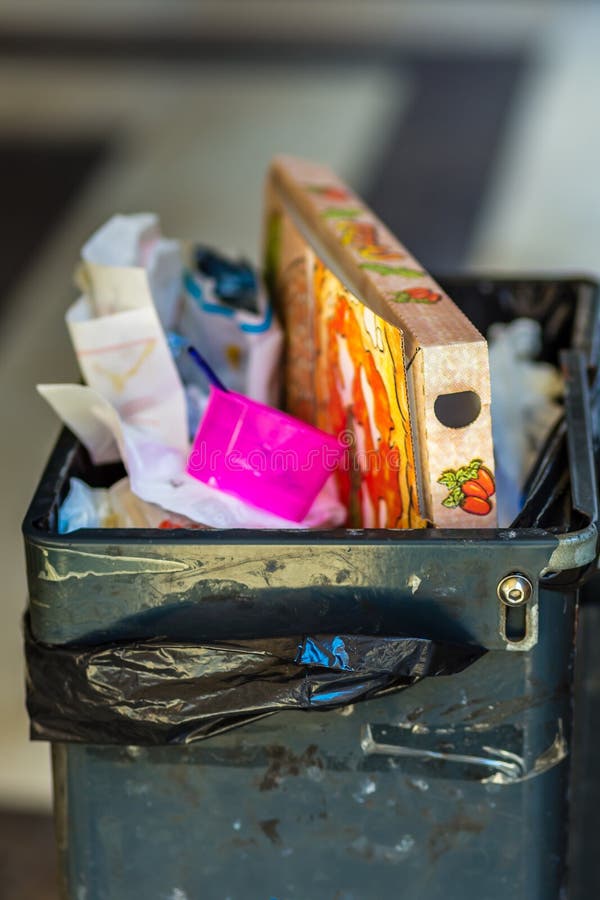 Trash bin full of garbage stock photo. Image of ecology - 170873856