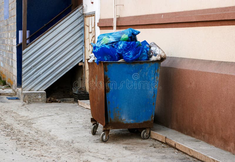 Trash Bin Full with Trash Packets Stock Photo - Image of recycling ...