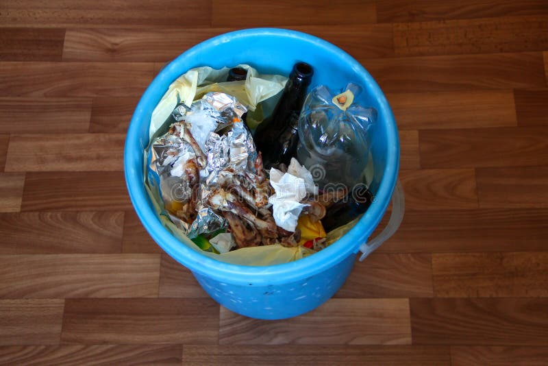 Trash Bin with Leftover Food and Chicken Bones, Close-up Stock Photo ...