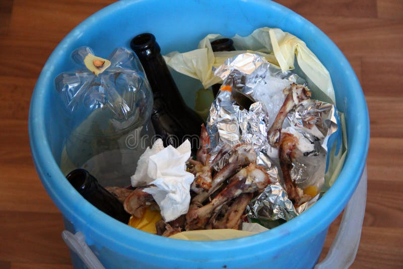 Trash Can with Chicken Leftovers Stock Image - Image of cooking, pail ...