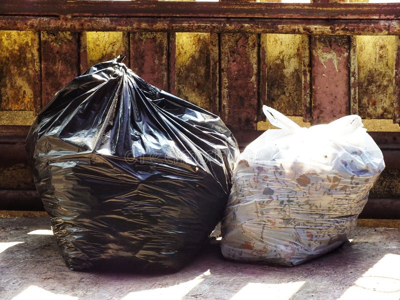 Trash Bin. Pile of Trash Bag. Garbage Plastic Bag at the Side Road in ...