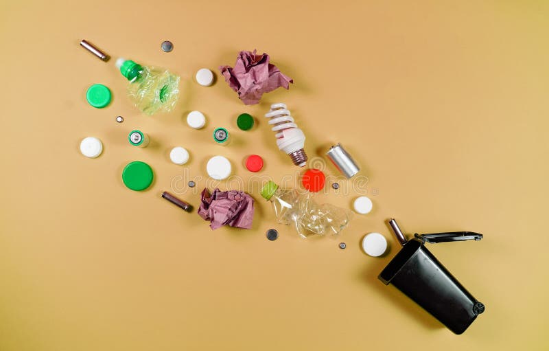 Trash Bins and Assorted Garbage Isolated on Green, Recycle Concept ...