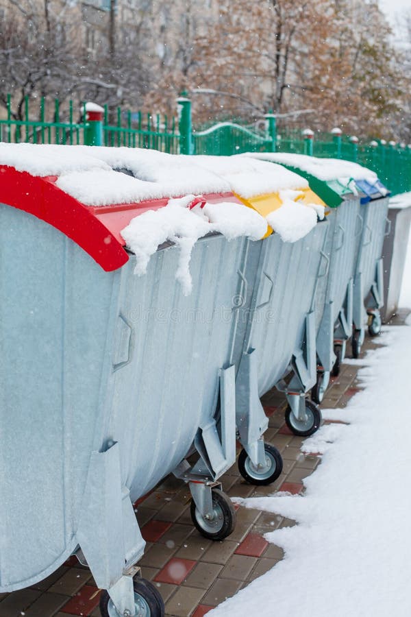 Trash Bins for Sorting Garbage are Standing on the Street Covered with ...