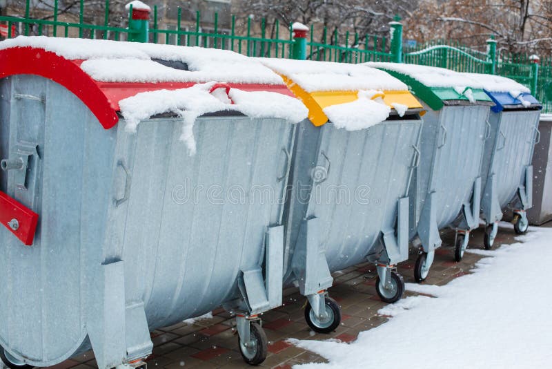 Trash Bins for Sorting Garbage are Standing on the Street Covered with ...