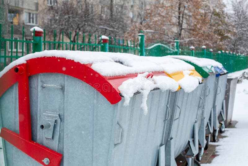 Trash Bins for Sorting Garbage are Standing on the Street Covered with ...