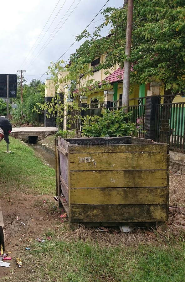 Trash box editorial photo. Image of asian, yellow, janitor - 105233136