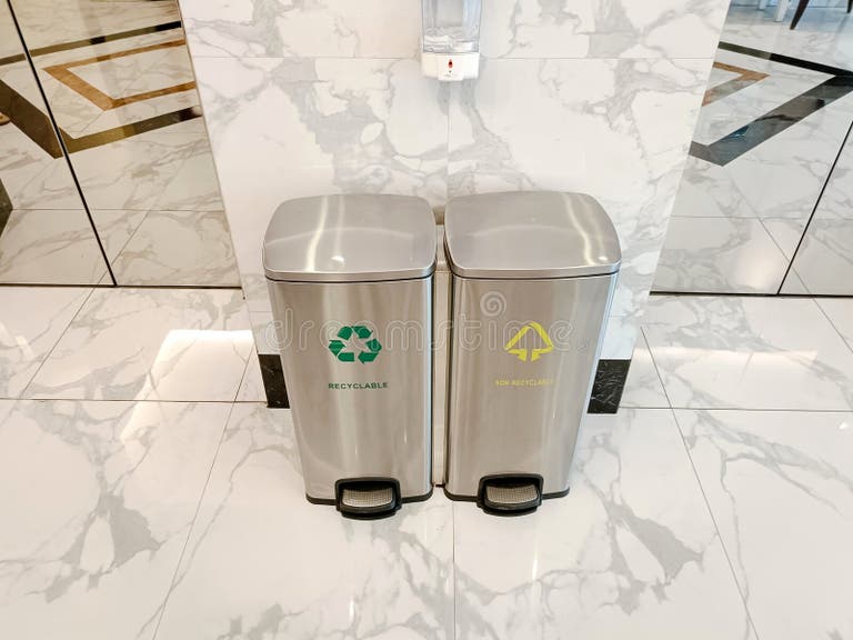 Trash Can with Compartments Based on Categories for Recycling in Front of the Elevator Door ...