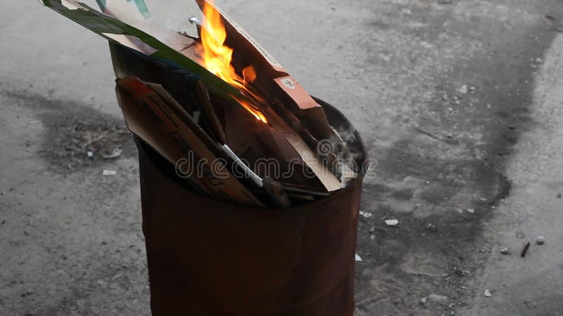 Trash Can Fire Rages in Steel Barrel Dumpster Can Stock Video - Video ...