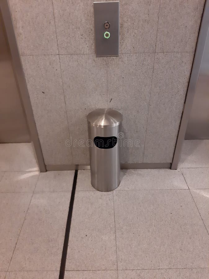 The Trash Can is Next To the Elevator To Make it Easier for Users To ...