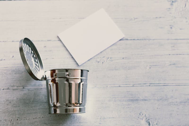 Trash Can with Paper Going into it Stock Image - Image of trash, online ...