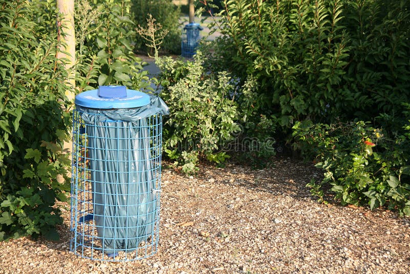 Trash can in the park stock image. Image of environment - 156550249