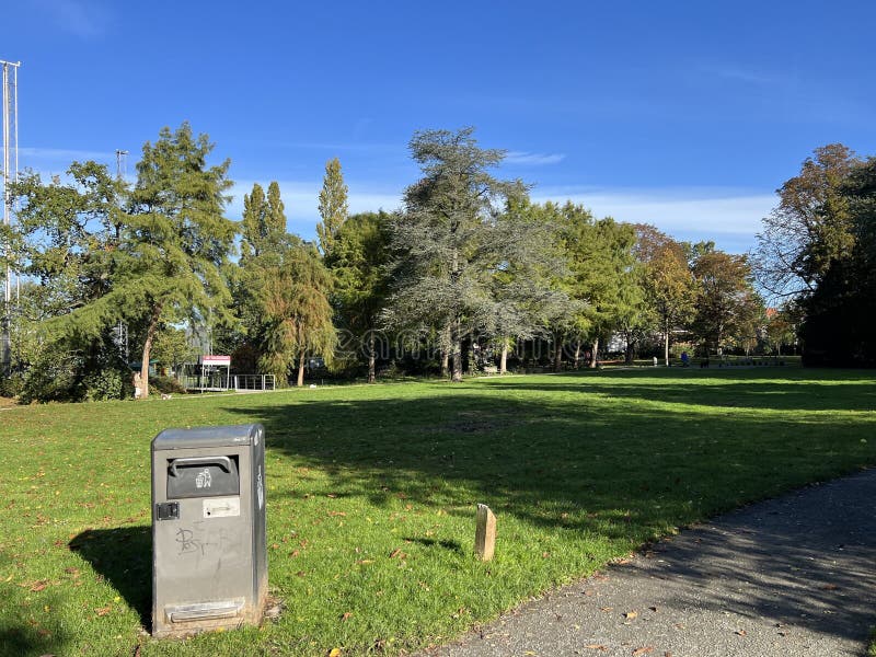 Trash can in the park stock photo. Image of lawn, farm - 389182786