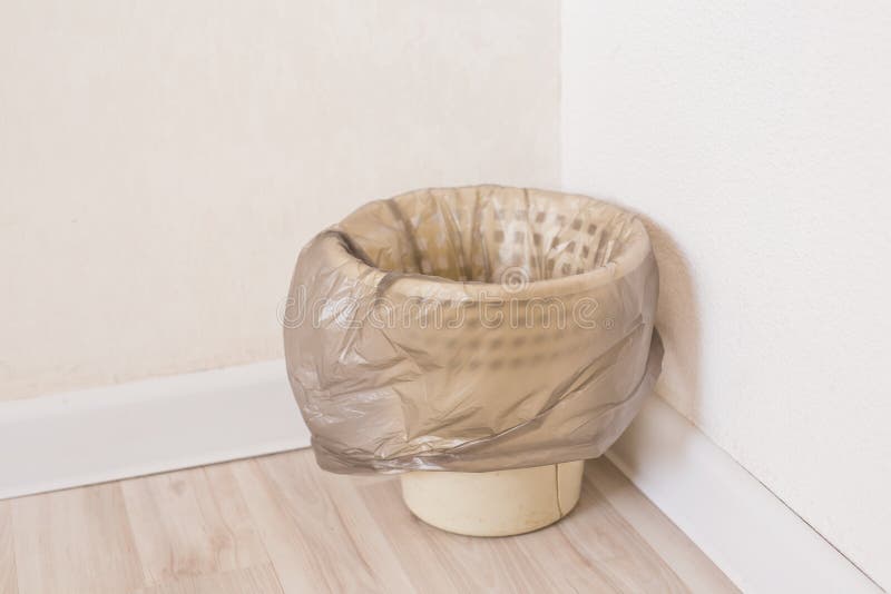 Trash Can with a Plastic Bag Inside Indoor Stock Image - Image of ...