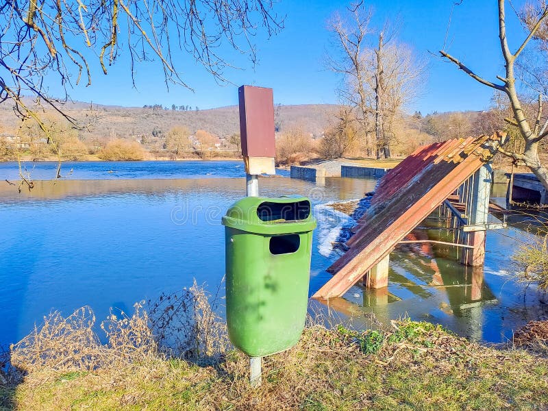 A Trash Can by the River Can Highlight the Beauty of the Natural ...