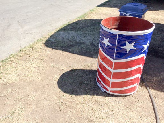 Trash Can Wrapped in American Flag Banner Concept Stock Photo - Image ...