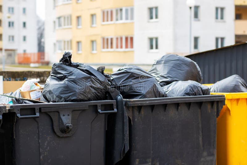 Trash Cans Filled Garbage Front Building Stock Photos - Free & Royalty ...