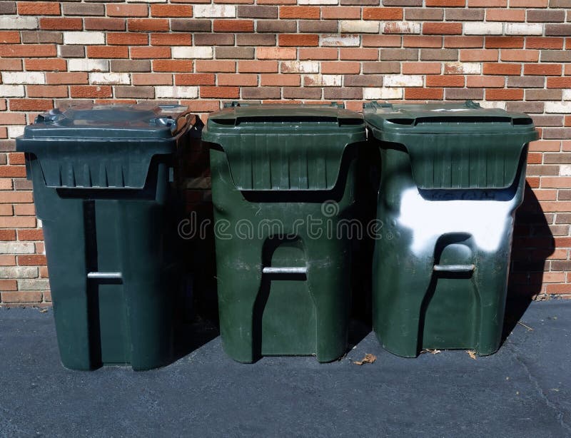 Trash Cans in Front of Brick Wall Stock Image - Image of refuse ...