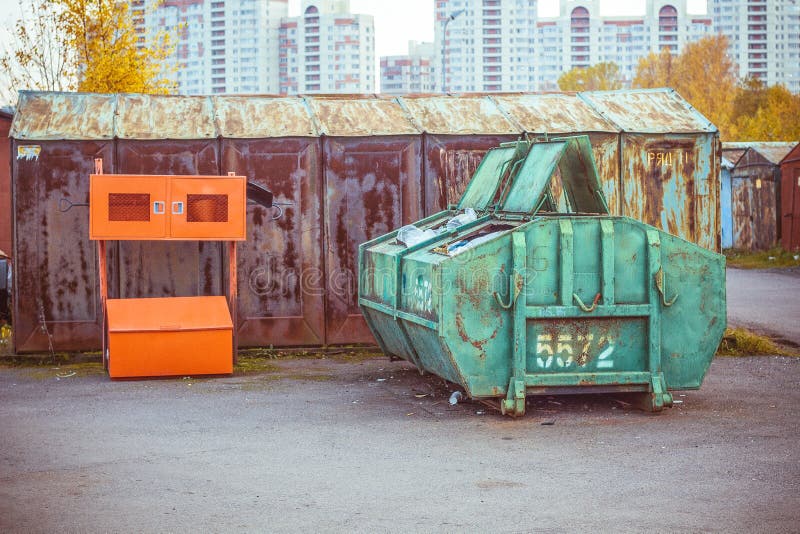 Trash Can in the Garage Parking Stock Image - Image of garage, dock ...