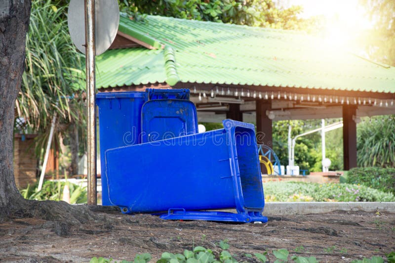 Trash Cans on the Side of the Road, Blue Trash Cans Stock Image - Image ...