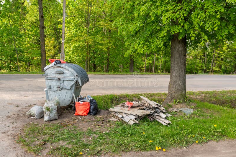 Trash Container Full with Garbage Along the Road Stock Photo - Image of ...