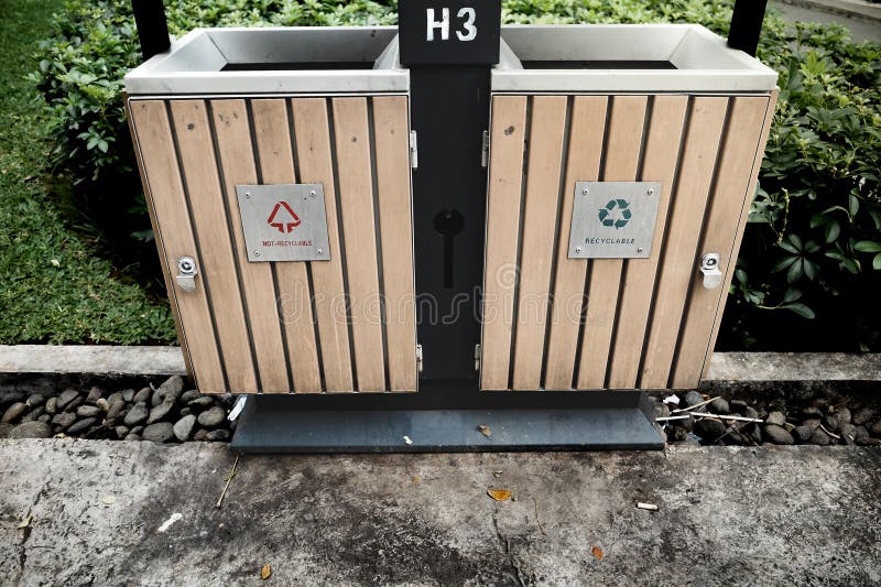 Recyclable and Non-Recyclable Trash Containers Standing in Outdoor ...