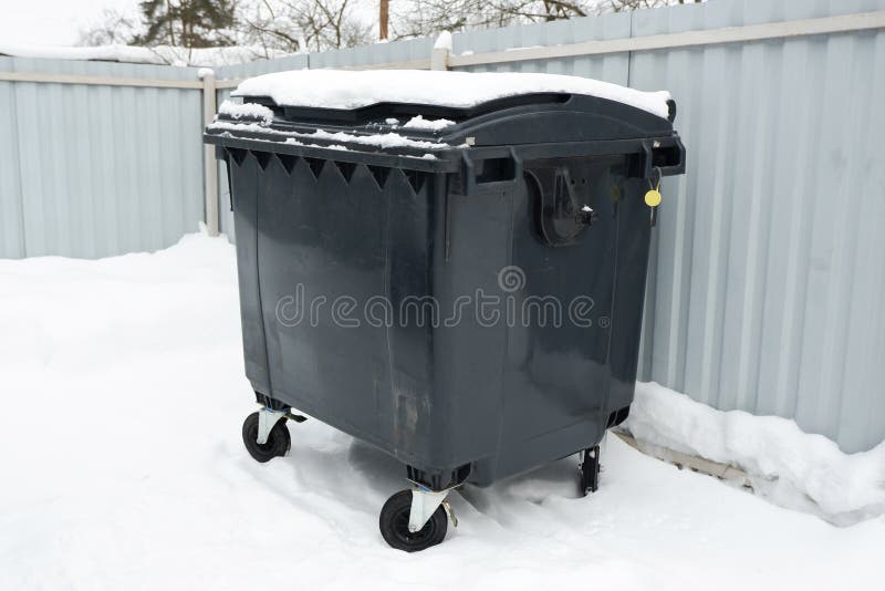Trash Container in Winter Surrounded by Snow Stock Photo - Image of ...