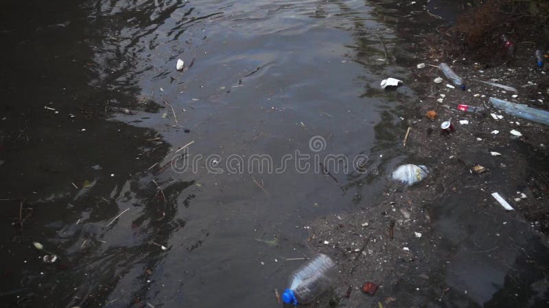 Trash and Garbage Floating on the Surface of the Water Stock Video ...