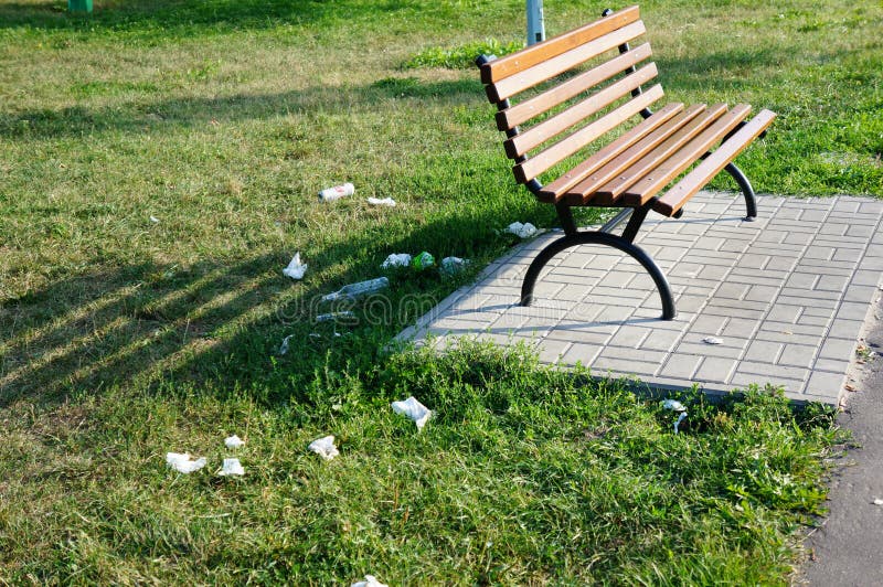 Trash on the grass editorial image. Image of bench, poland - 44531050