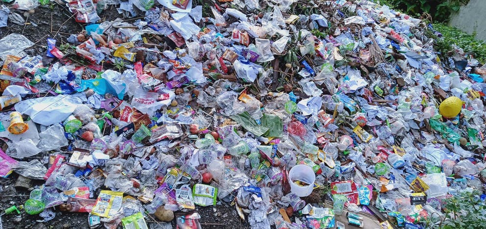 Trash heap on the ground editorial stock image. Image of heap - 264078024