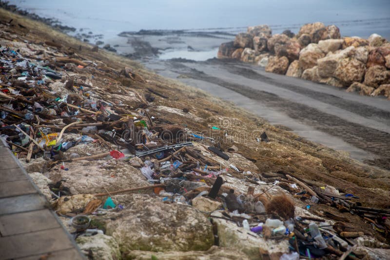 Trash moved aside to shore stock image. Image of lots - 376632403